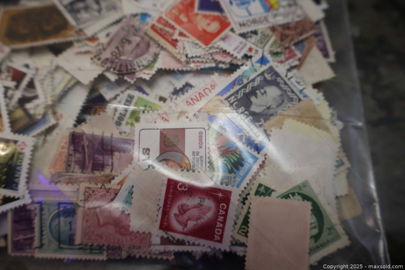 Bag of assorted world postage stamps | Maxsold