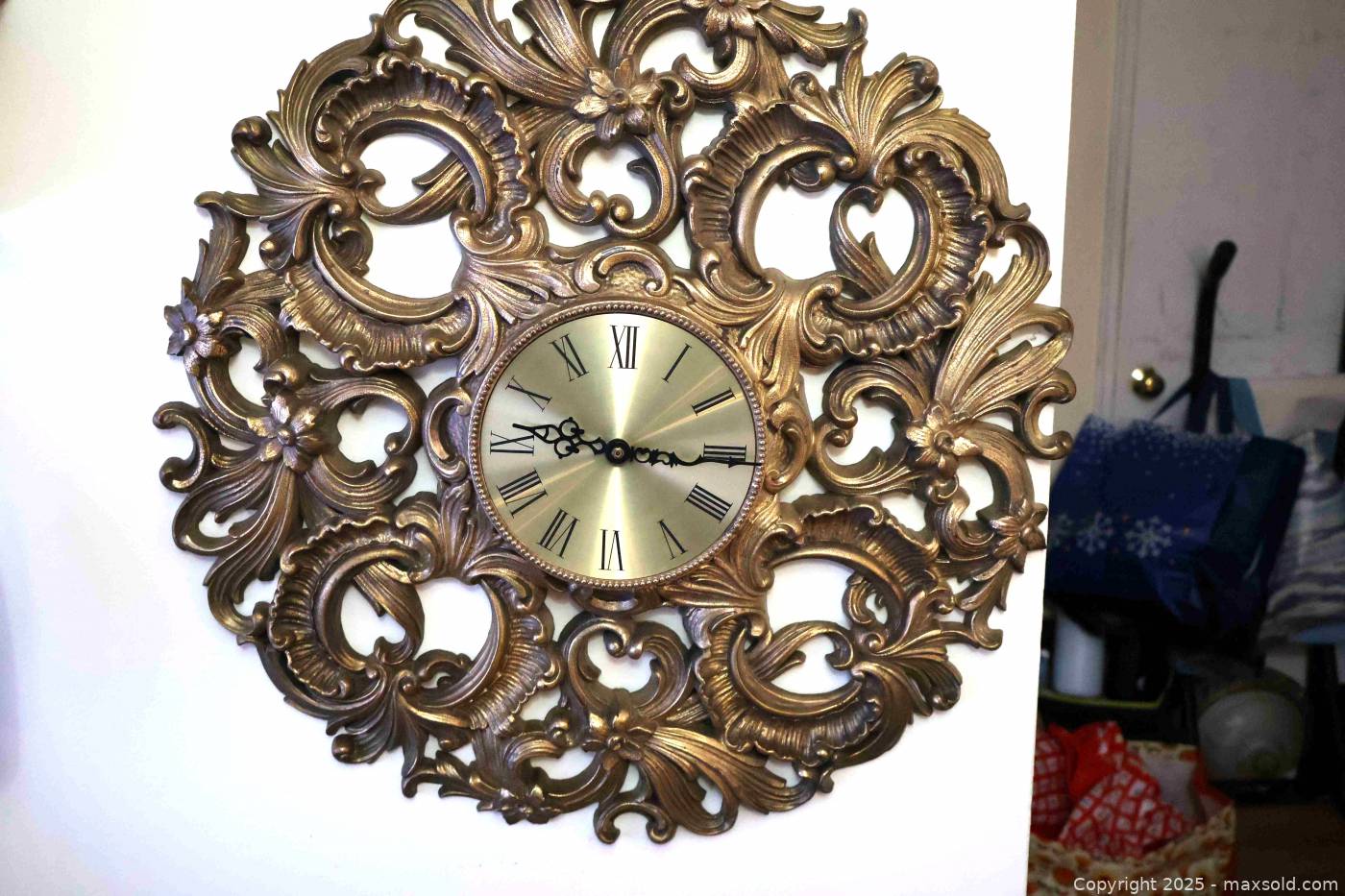 Large baroque wall clock | Maxsold