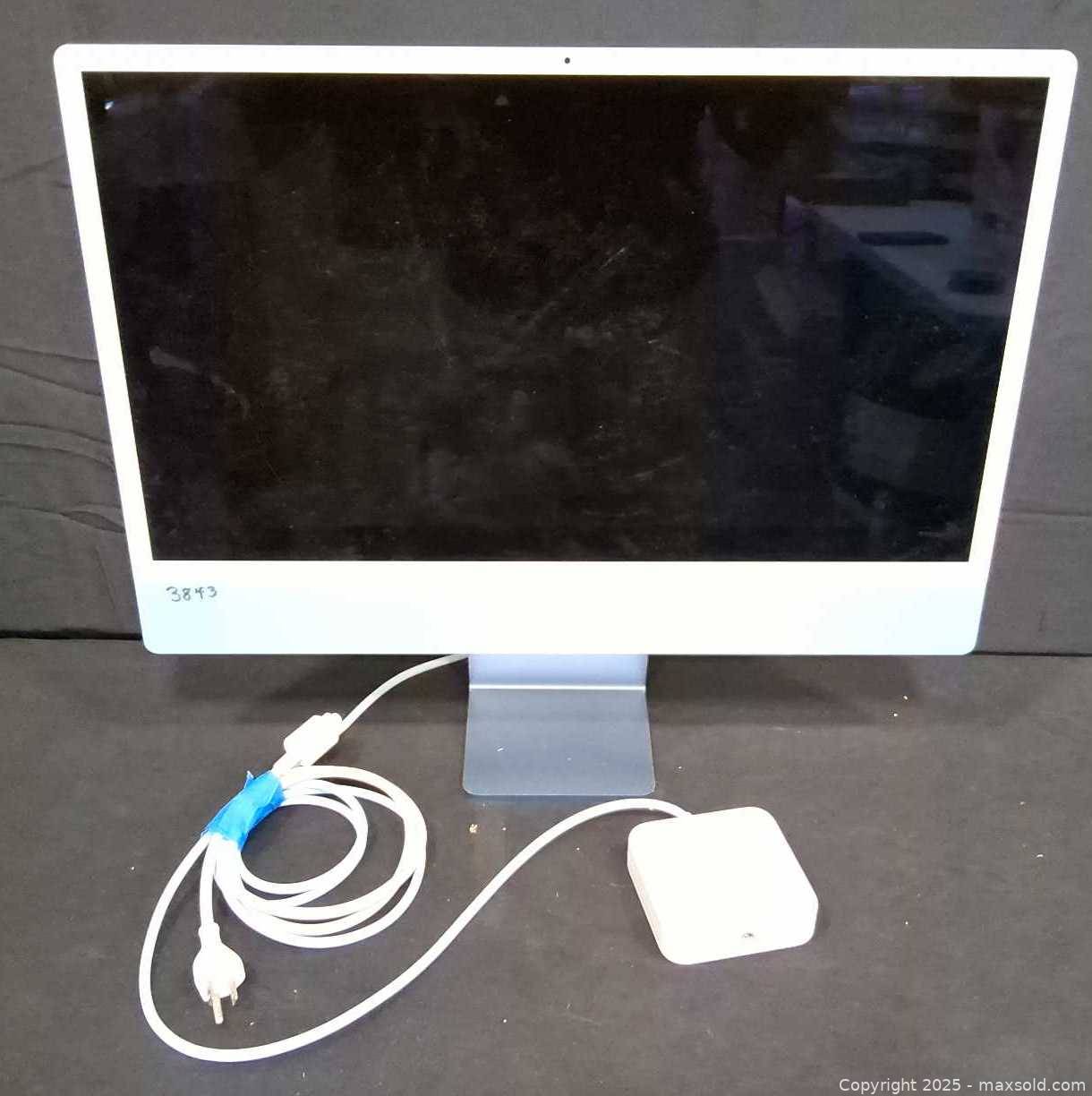 Apple 24-inch Blue iMac with power adapter | Maxsold