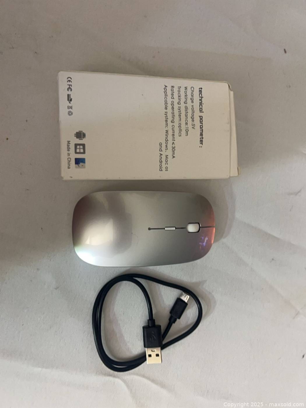 Wireless rechargeable optical mouse w/cable | Maxsold