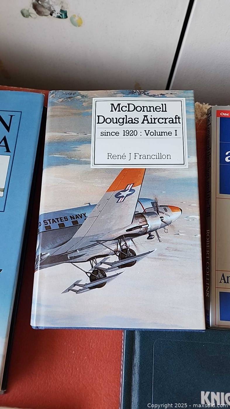 9 aviation history and flight books | Maxsold