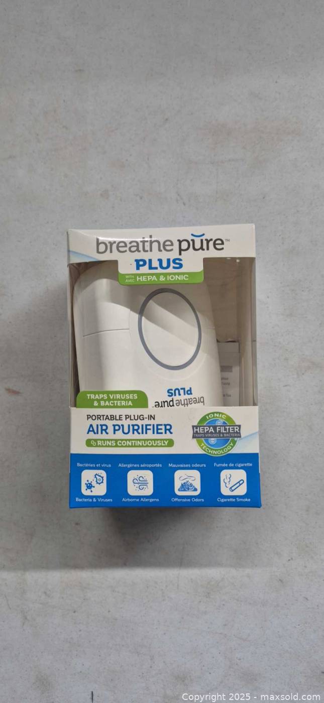 Breathe Pure Plus portable plug-in air purifier | Maxsold