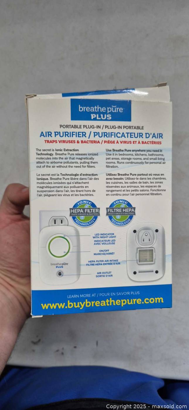 Breathe Pure Plus portable plug-in air purifier | Maxsold