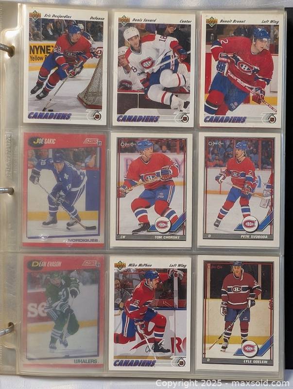 Binder with assorted mint hockey trading cards | Maxsold