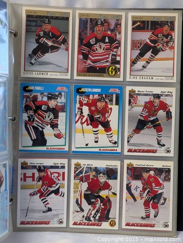 Binder with assorted mint hockey trading cards | Maxsold