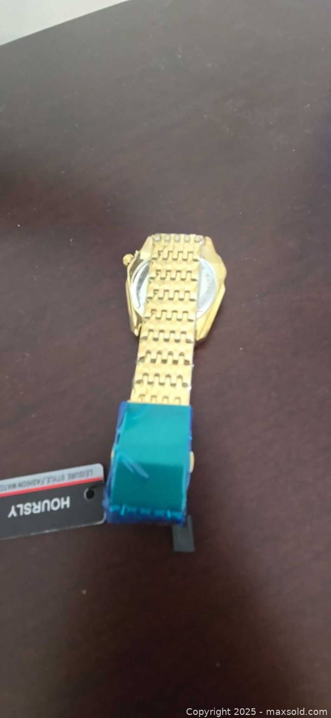 Hoursly gold-tone wristwatch in box | Maxsold