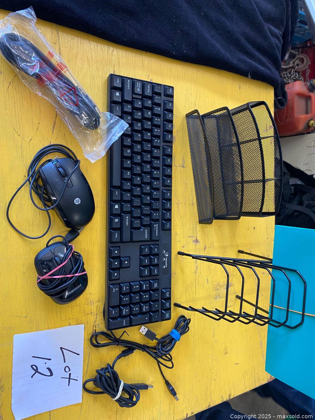 Wired keyboard, two USB mice, mesh letter organizers, assorted cables ...