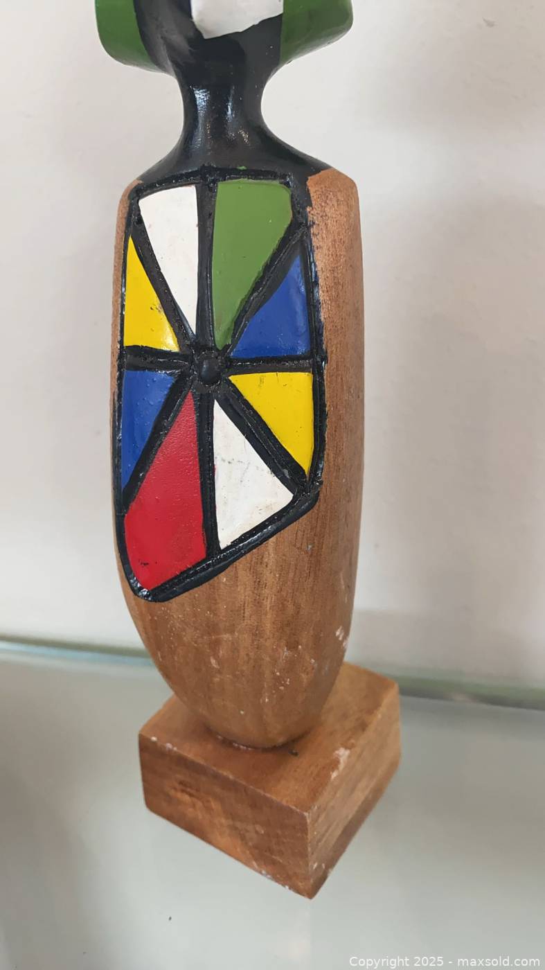 Frank Coronado painted wood figure | Maxsold