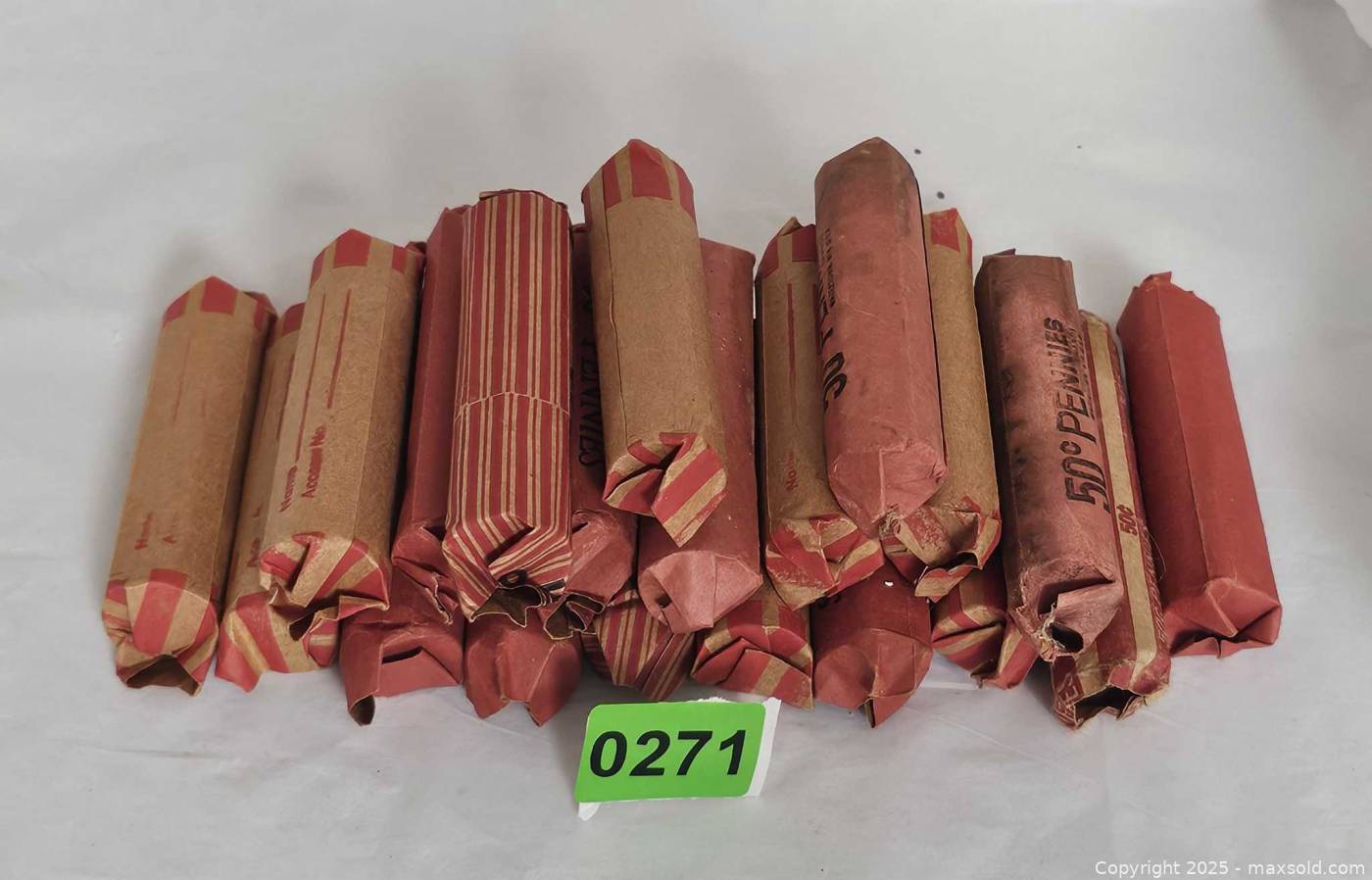 20 wrapped rolls of pennies | Maxsold