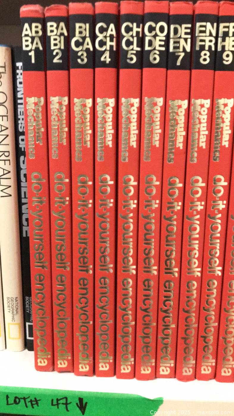 National Geographic books with Popular Mechanics DIY encyclopedia vols ...