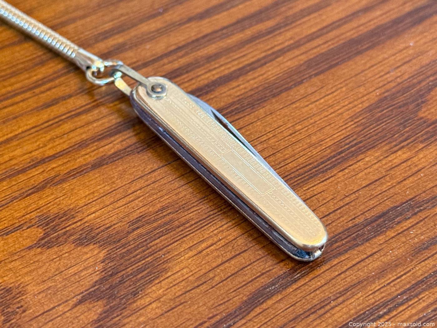 Gold plated mini folding pocket cutter keychain | Maxsold