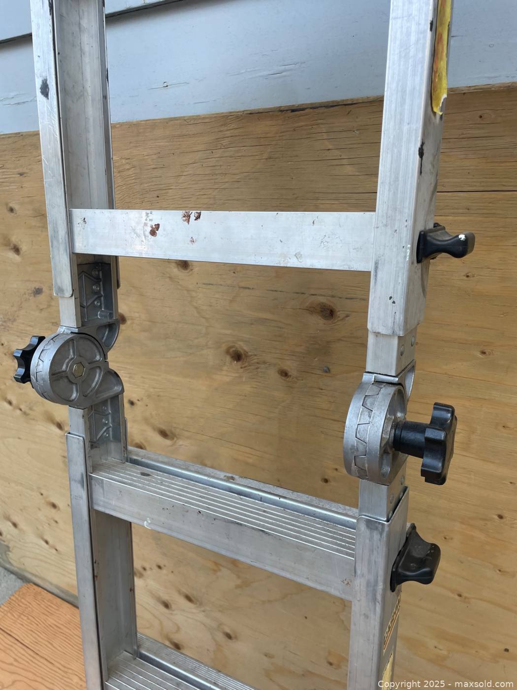 Multi-position aluminum articulating ladder | Maxsold