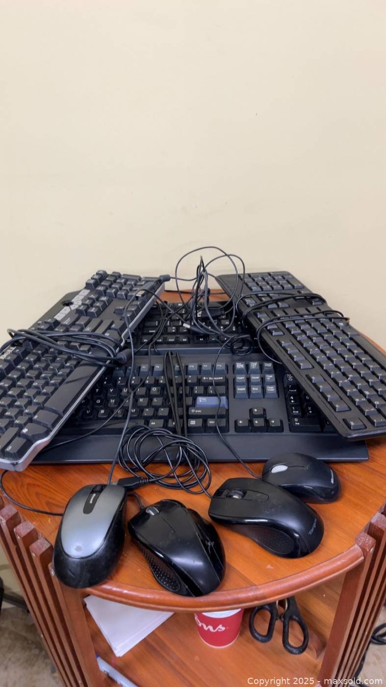Mixed USB keyboards, wired mice, cube heater and 5 office bins | Maxsold