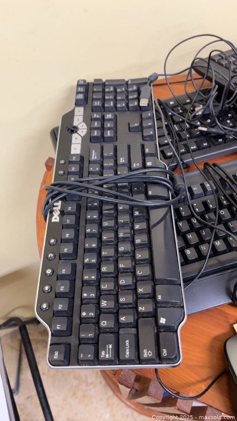 Mixed USB keyboards, wired mice, cube heater and 5 office bins | Maxsold