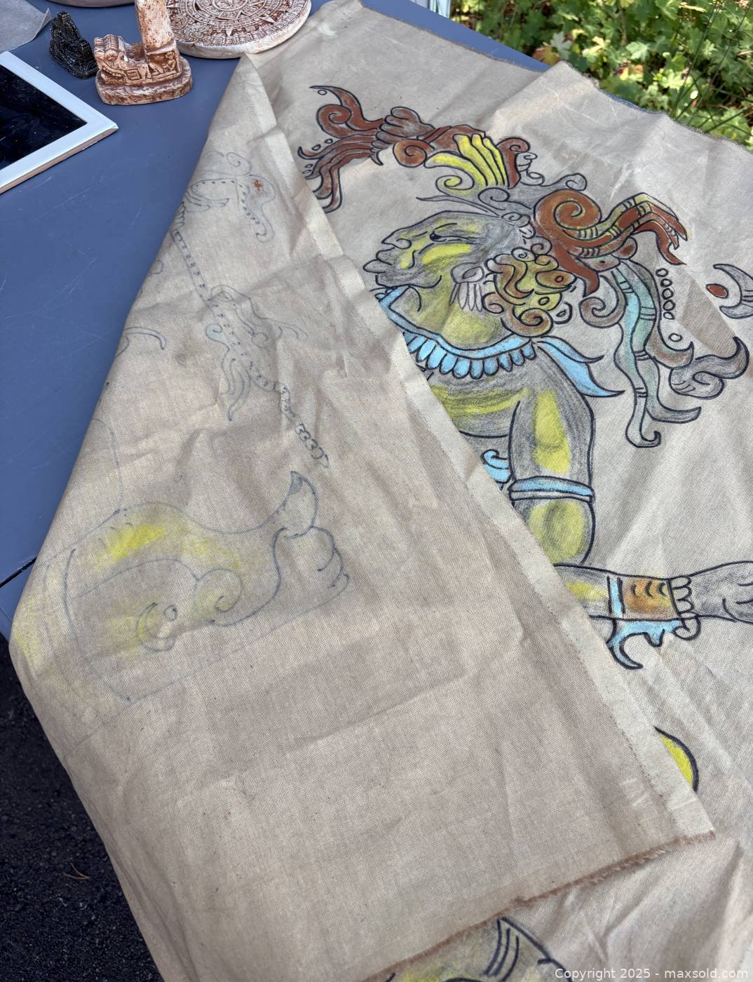 Mexican style textile art with terracotta plaques, small figurine ...