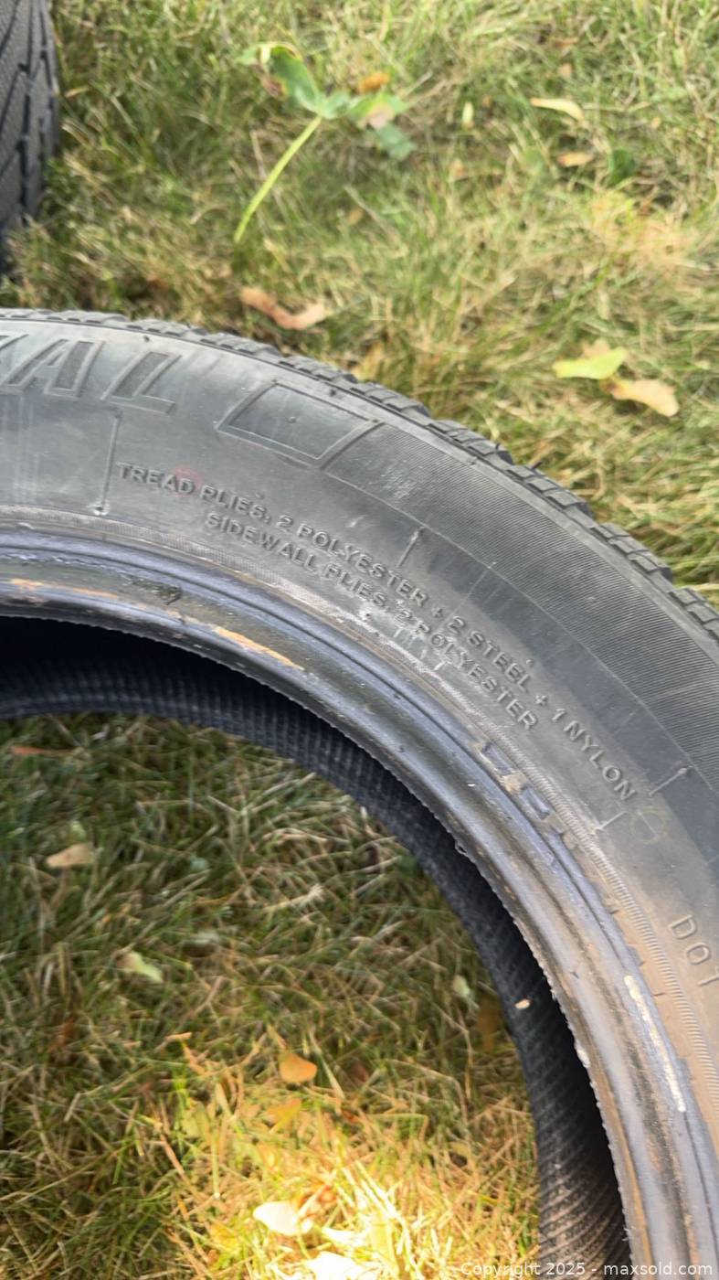 Two Uniroyal 215/55R16 Tiger Paw Ice & Snow tires | Maxsold