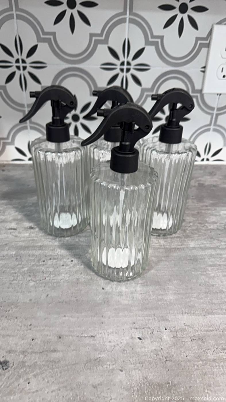 4 clear glass spray bottles 8"H | Maxsold