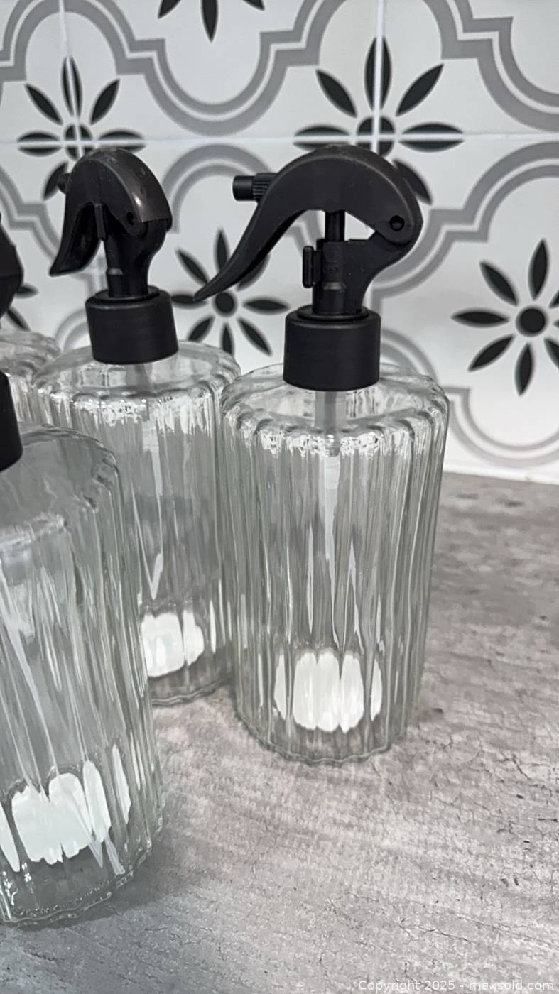 4 clear glass spray bottles 8"H | Maxsold