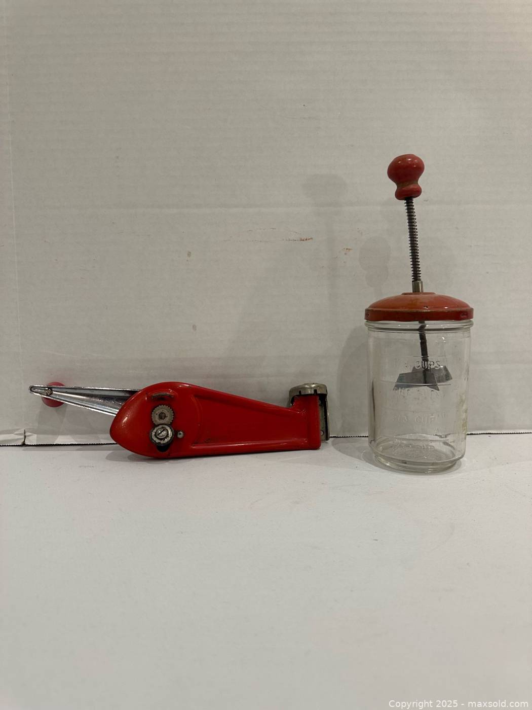 Vintage Rival Can-O-Mat Jr. can opener with spring whisk jar | Maxsold