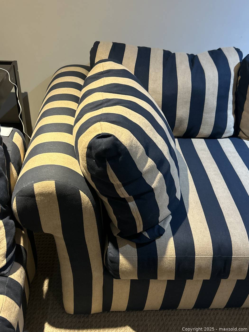 Dark blue and pale grey striped sofa | Maxsold