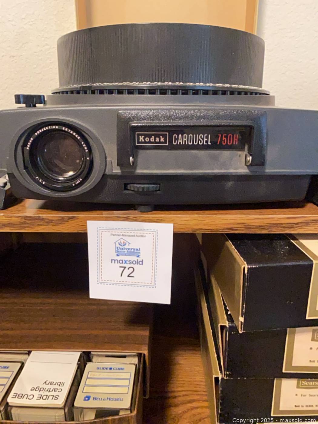 Kodak Carousel 750H slide projector with trays, remote and slides | Maxsold