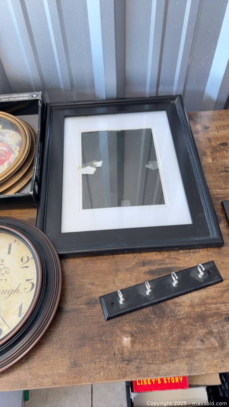 Clocks picture frames and key rack | Maxsold