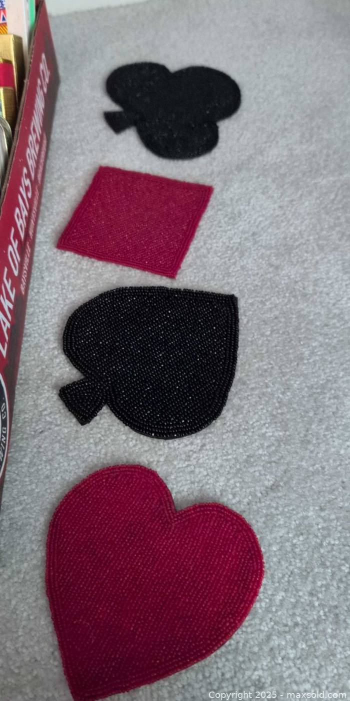 Playing cards, score pads, Scrabble books, suit-shape coasters | Maxsold