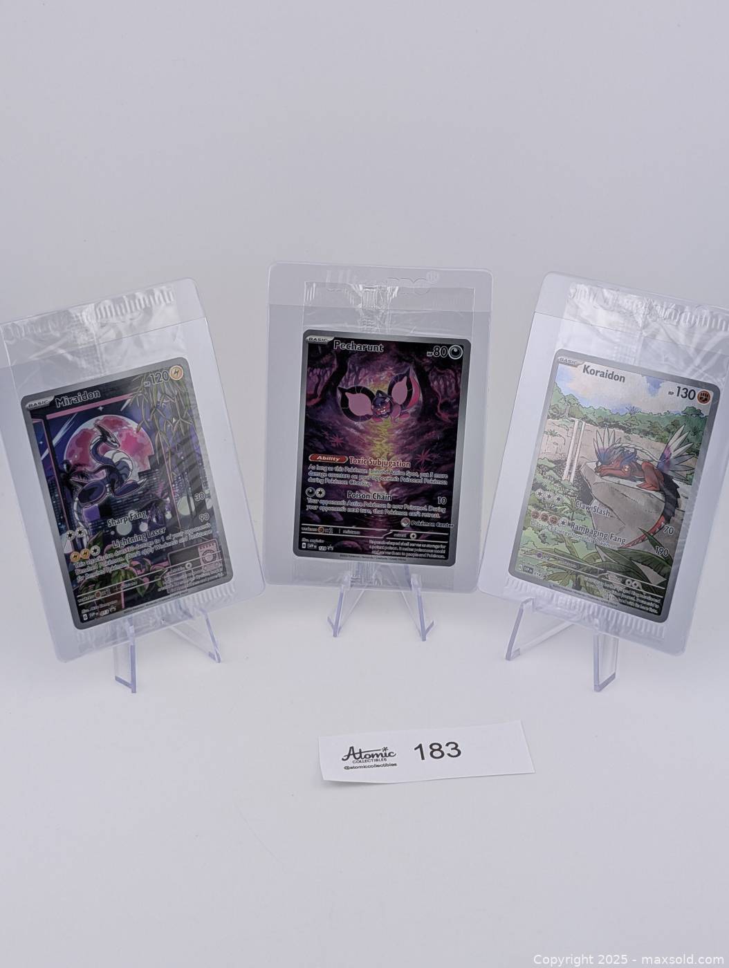 Sealed Pokémon Promo Cards Miraidon, Koraidon & Pecharunt | Maxsold