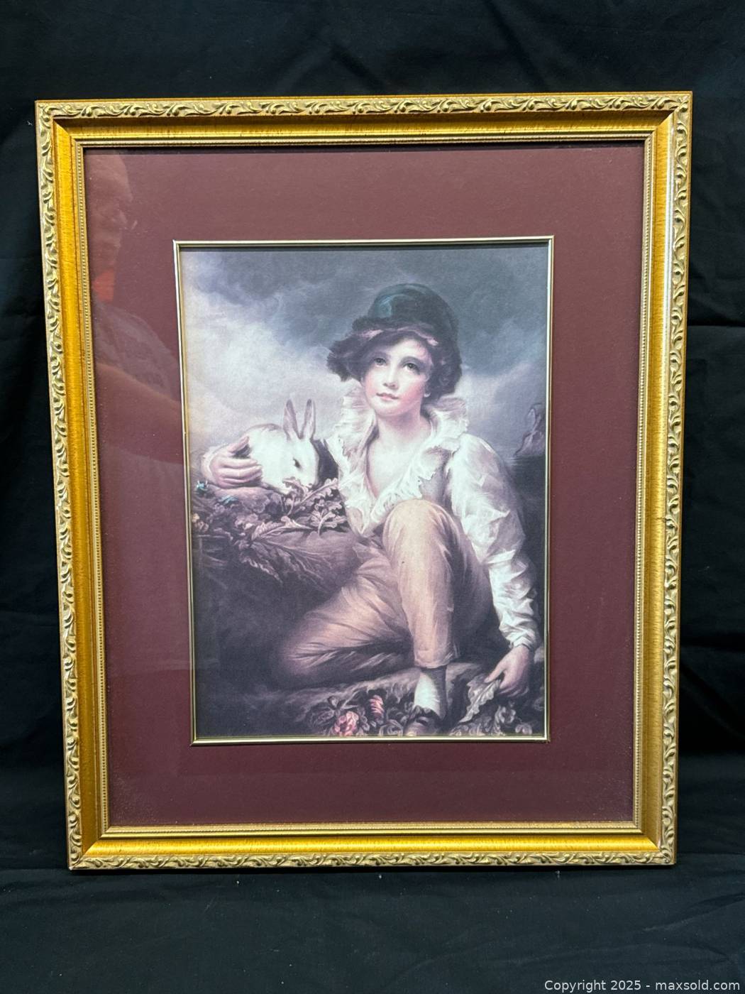 Framed portrait print of boy with rabbit 18.5x23 | Maxsold