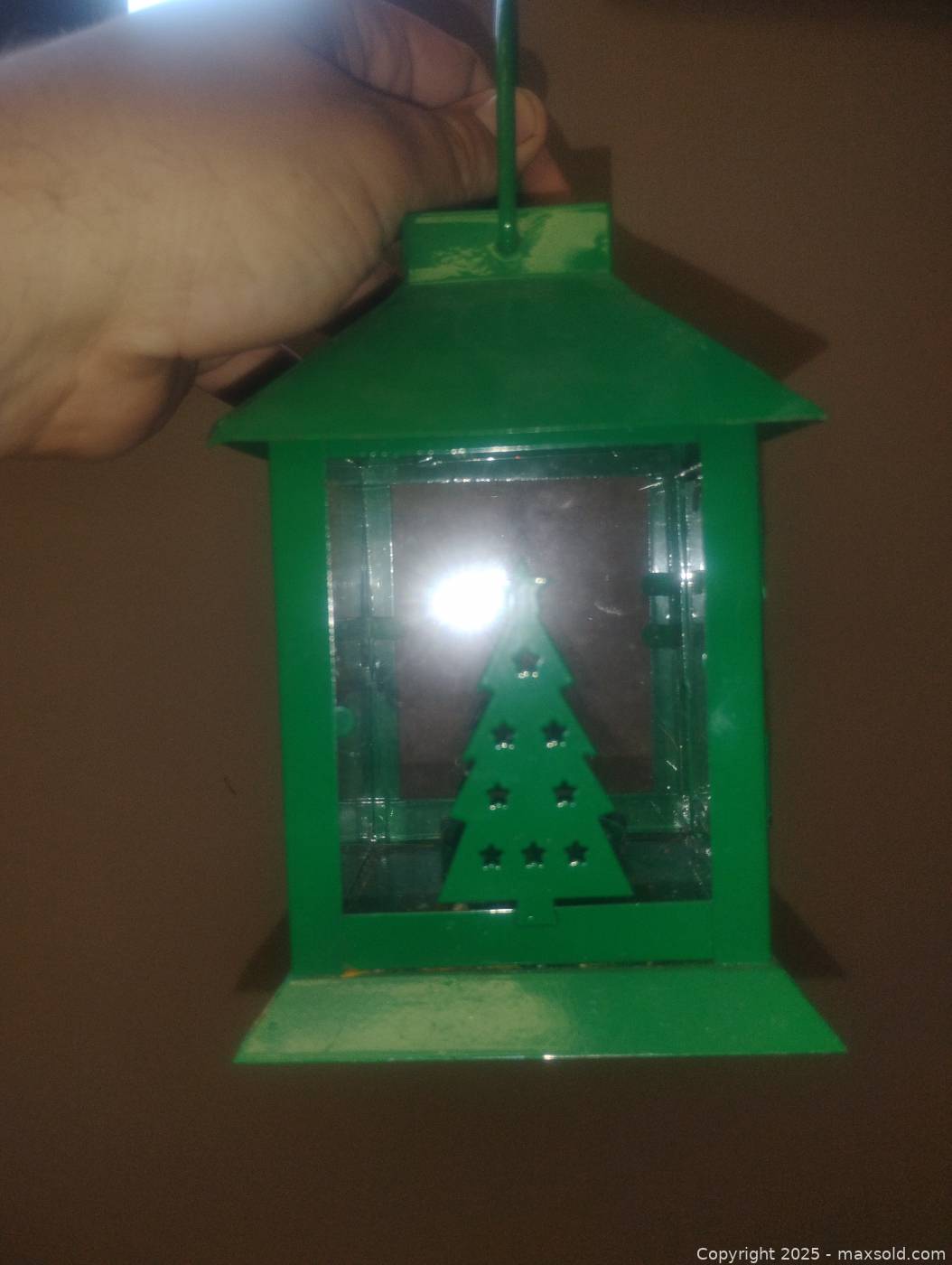 Green metal Christmas tree lantern | Maxsold