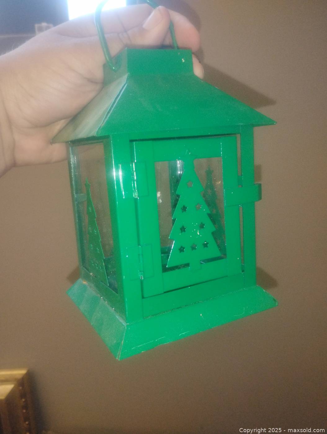 Green metal Christmas tree lantern | Maxsold