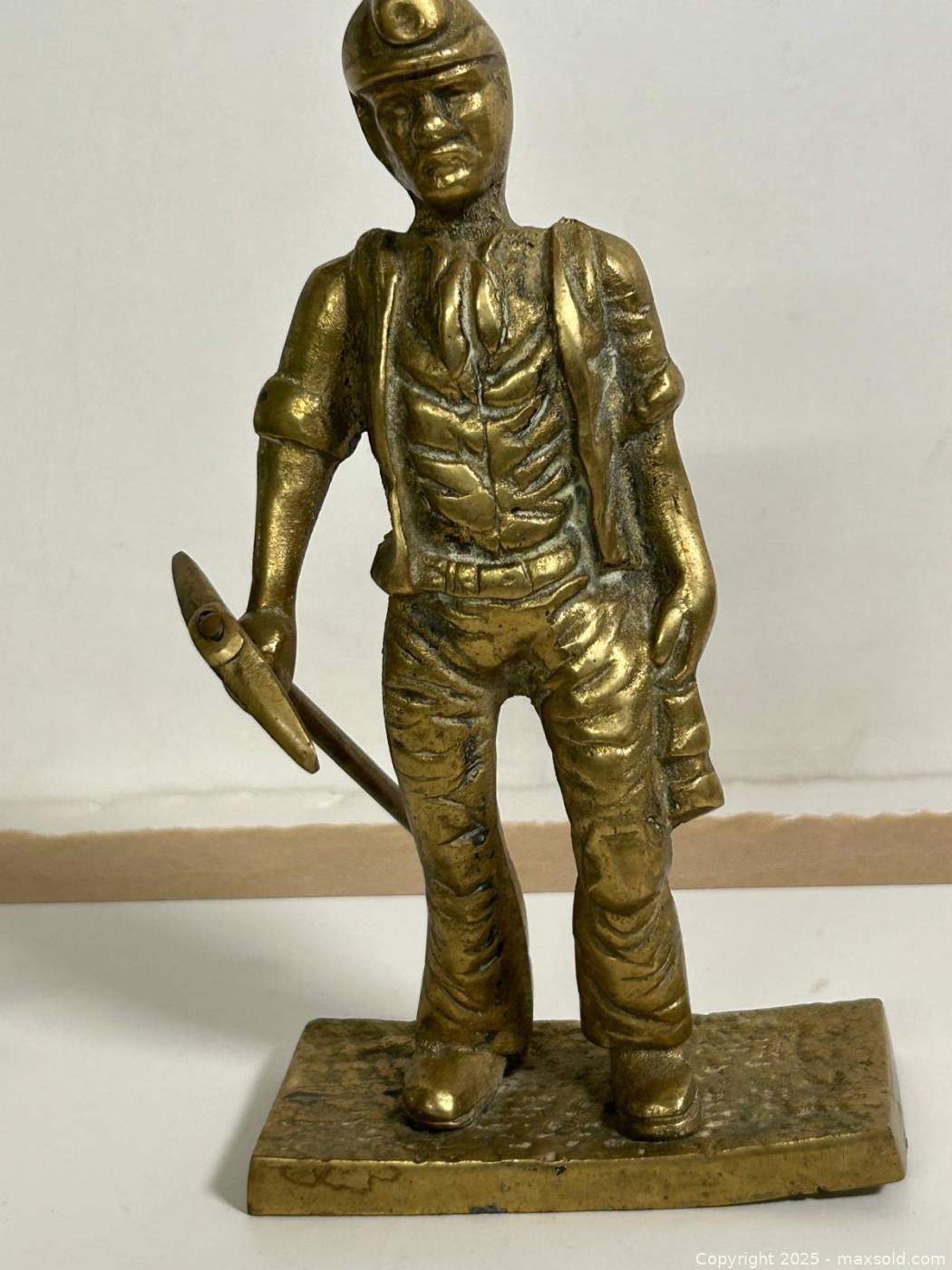 Solid brass coal miner figurine, 7 in. | Maxsold