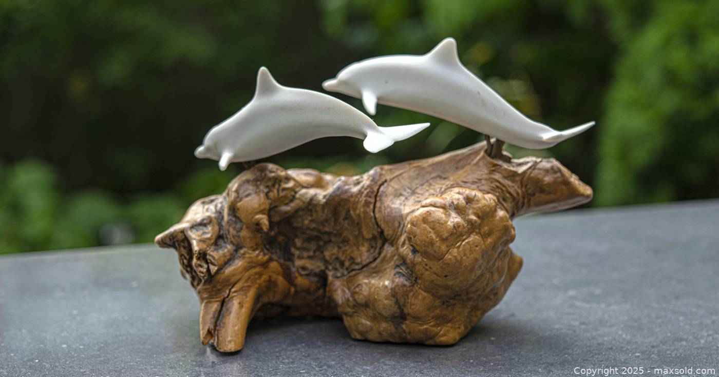 John Perry dolphin duo burlwood sculpture | Maxsold