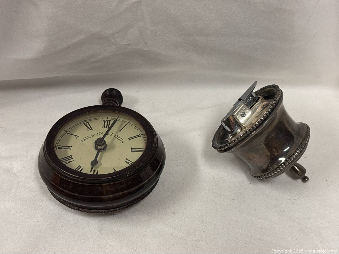 Milson & Louis table pocket watch clock and metal table lighter | Maxsold