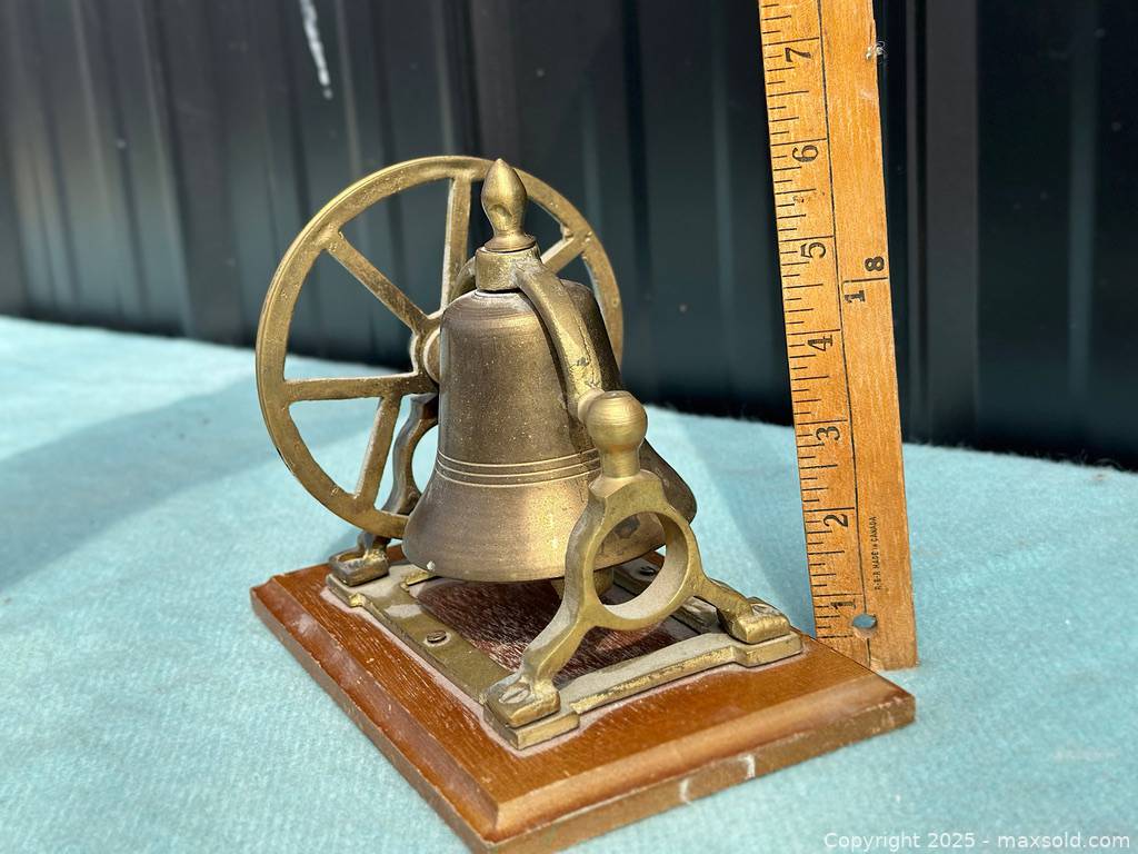 Antique miniature brass church bell on wood base | Maxsold