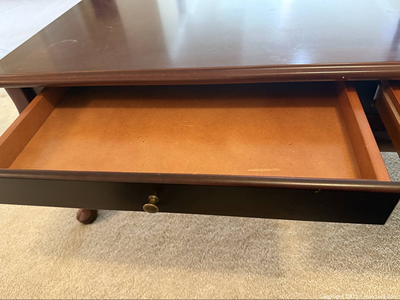 Theseira wooden coffee table with drawers | Maxsold