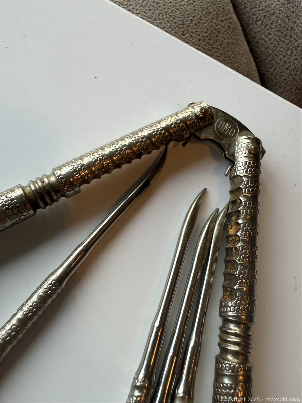 Vintage HMQ metal nutcracker set | Maxsold