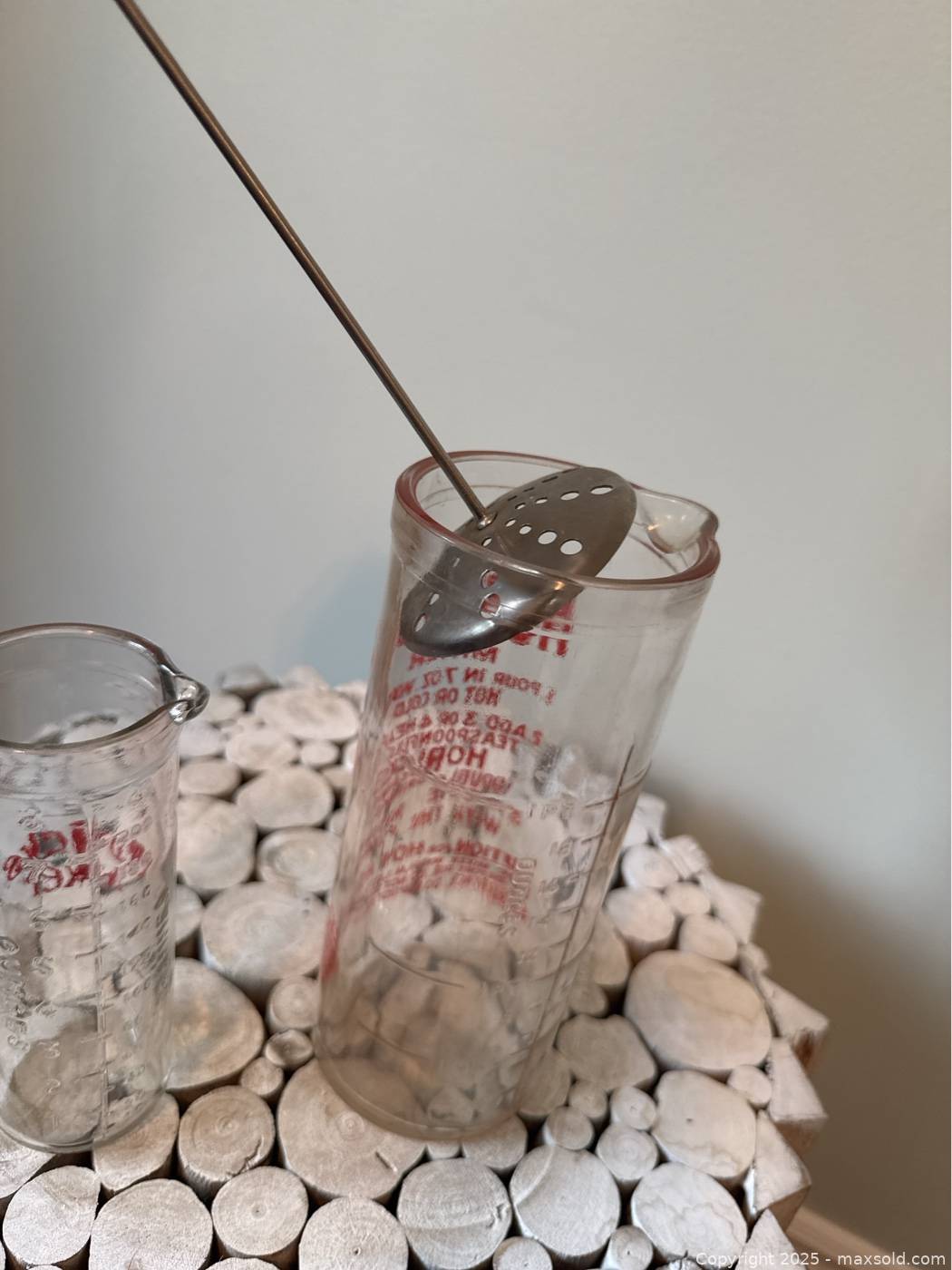 Two vintage glass Horlicks mixers with plunger | Maxsold