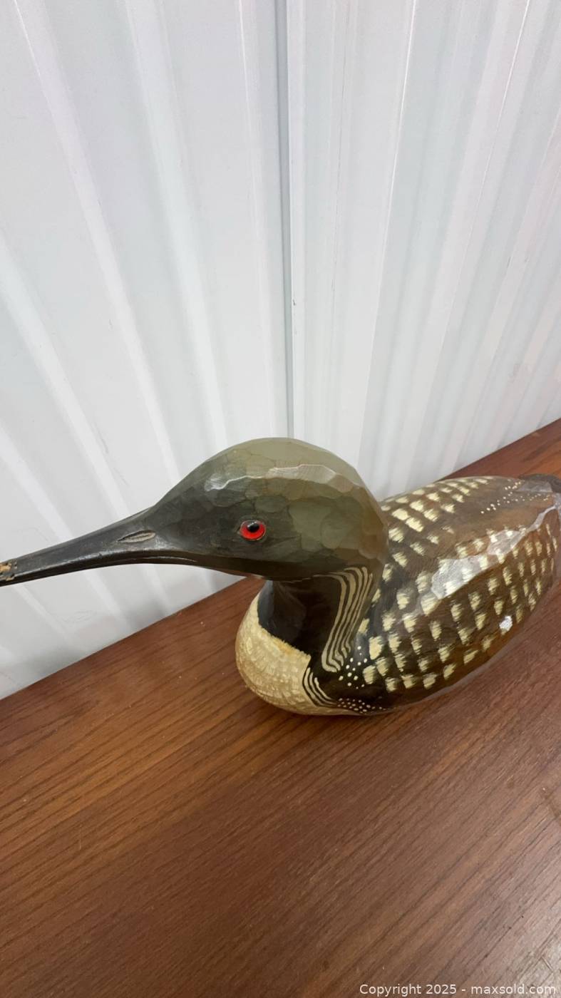 Signed hand-carved wooden Arctic loon sculpture, 1985 | Maxsold