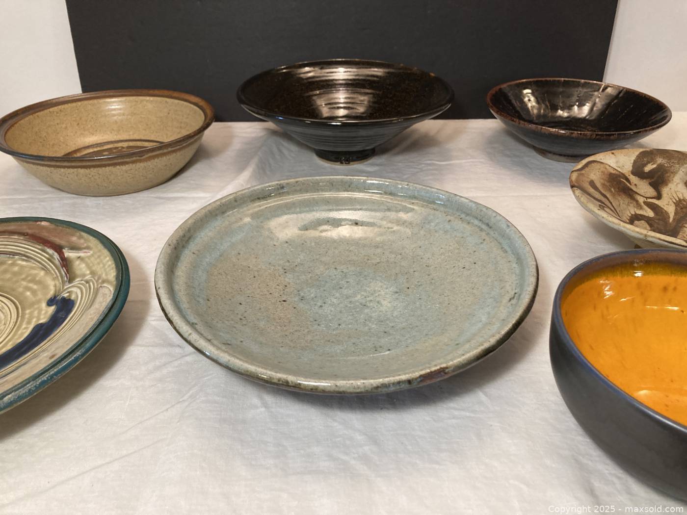 Seven studio pottery bowls | Maxsold