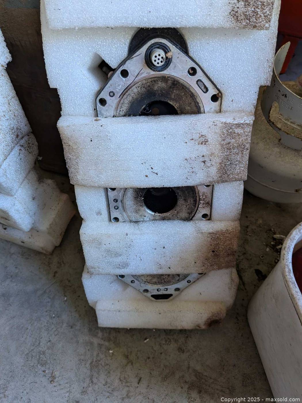 Two outboard engine cylinder heads | Maxsold