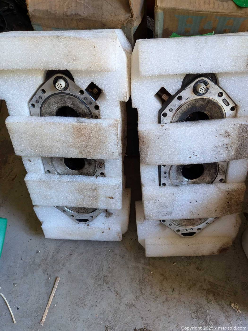 Two outboard engine cylinder heads | Maxsold
