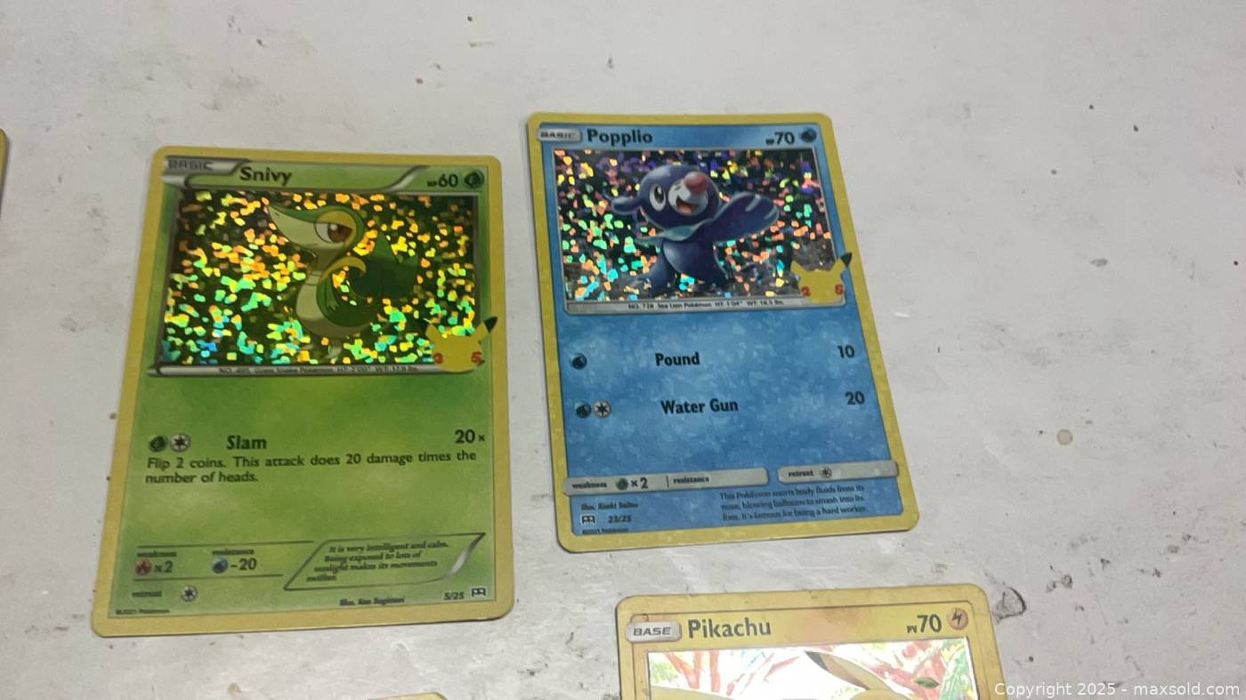 Six holographic Pokémon trading cards | Maxsold