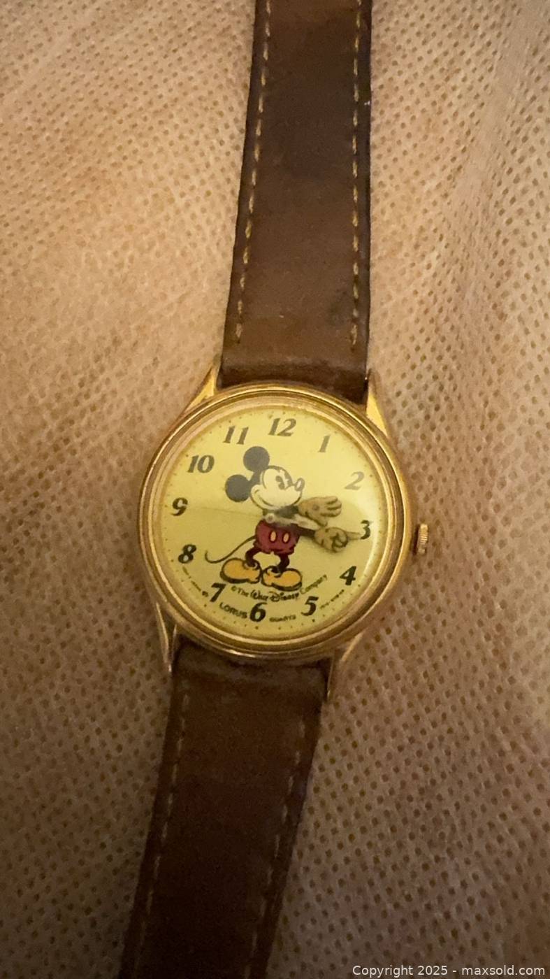 1980s Mickey Mouse touch-tone corded telephone and vintage wristwatch ...