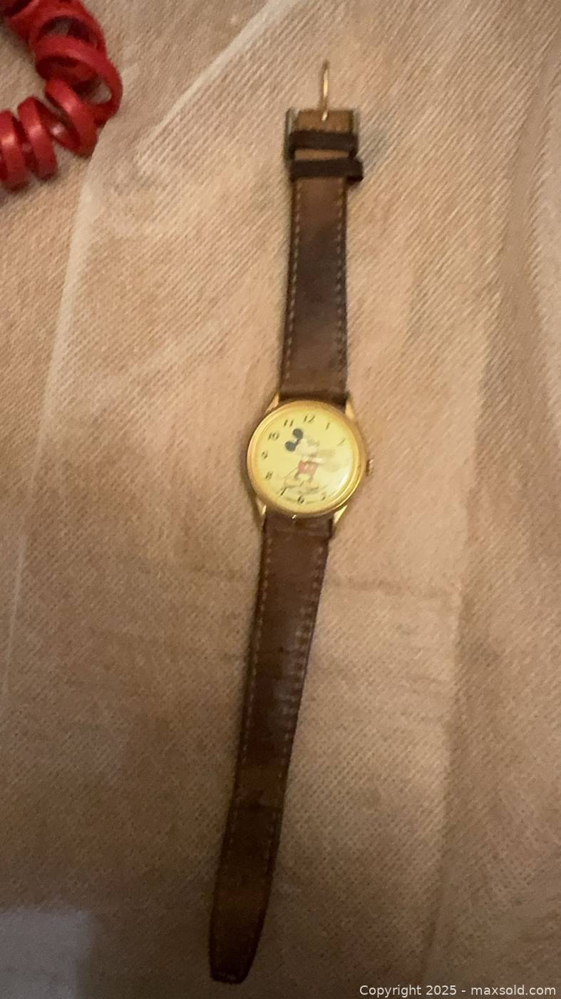 1980s Mickey Mouse touch-tone corded telephone and vintage wristwatch ...