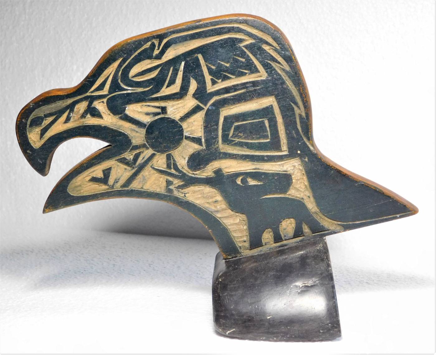 Vintage Indigenous wood bird carving on stone base | Maxsold