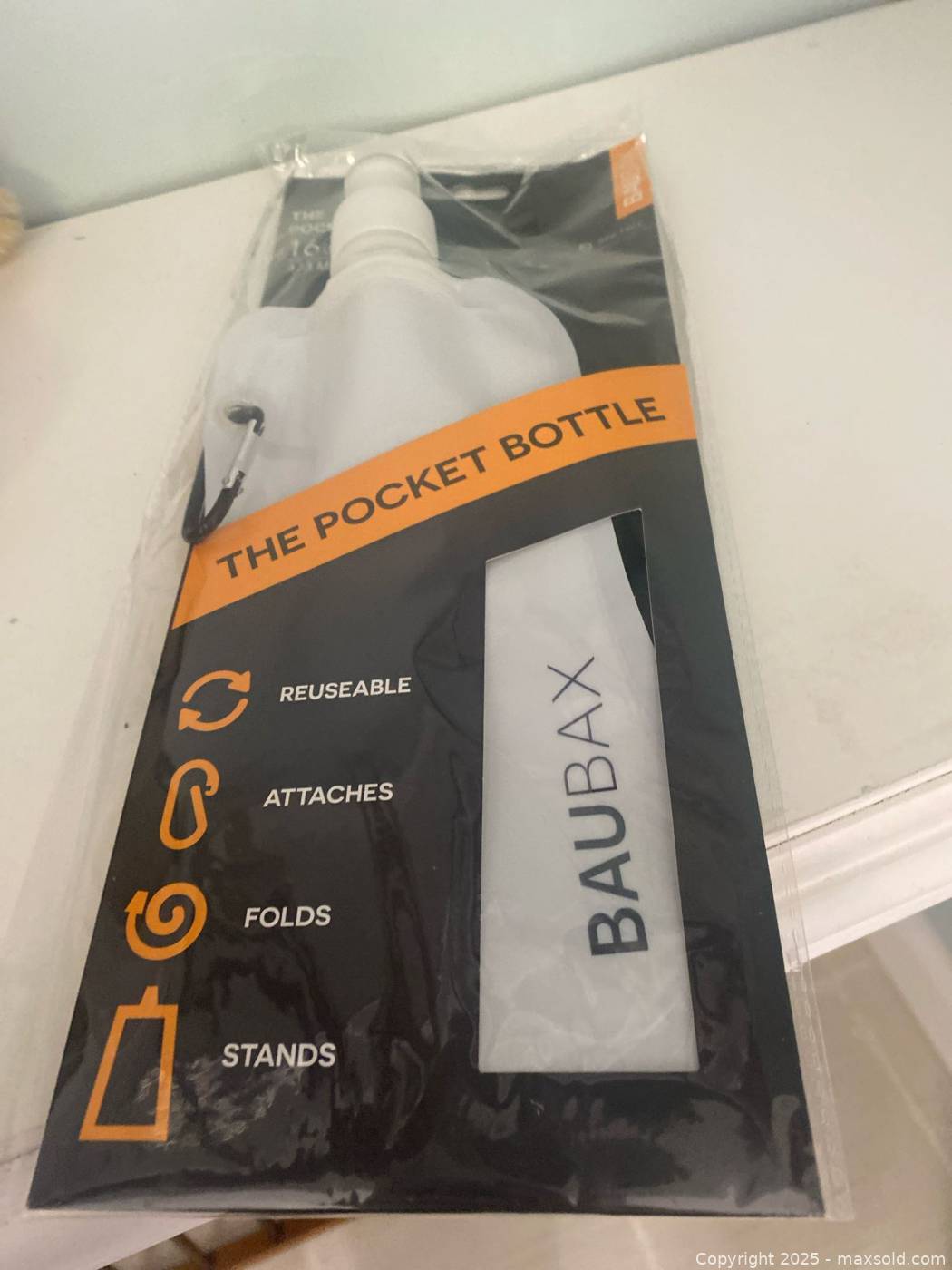 Plush dog, Baubax pocket bottle, OXO compact cold-brew maker, first aid ...