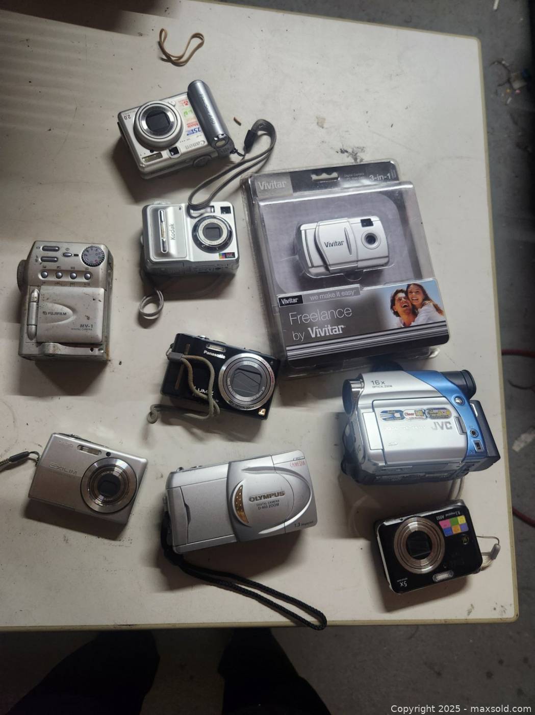 Assorted Digital Cameras And Camcorder | Maxsold
