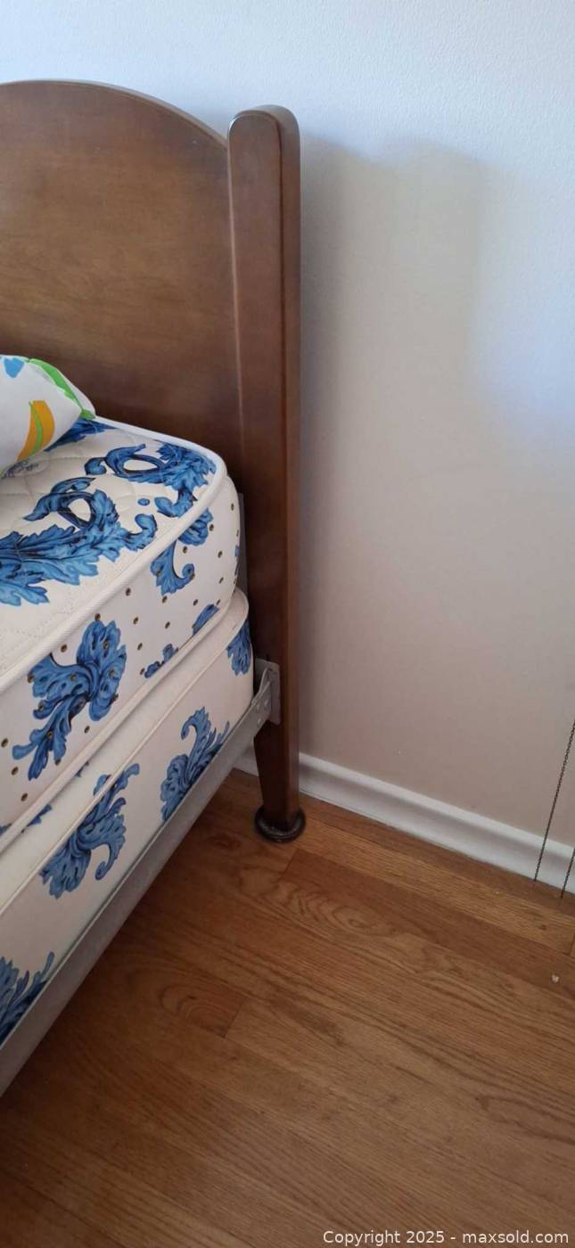 Twin wood bed frame with Simpsons Sears Royale mattress | Maxsold