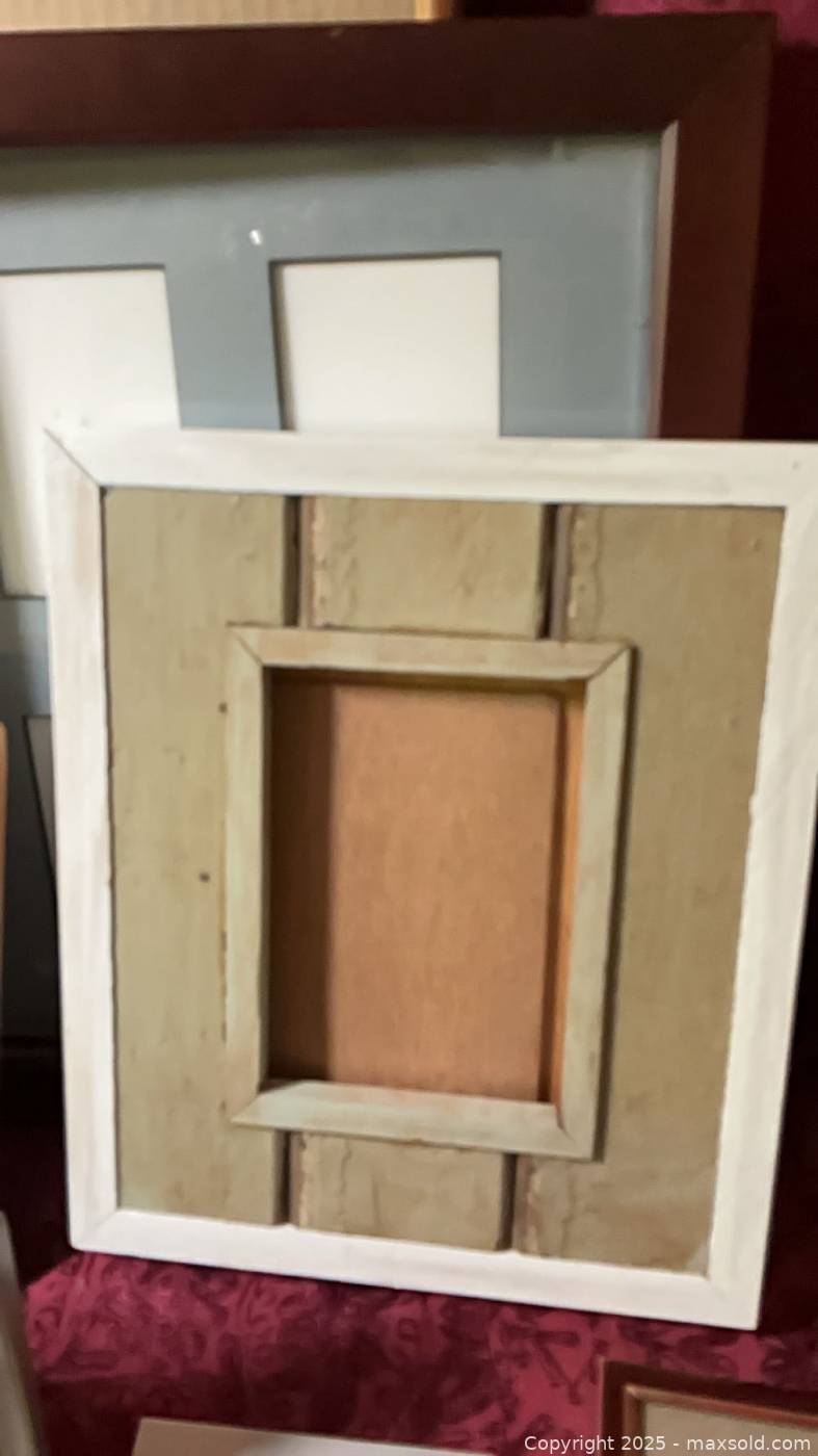 Assorted wood, metal, plastic photo frames | Maxsold